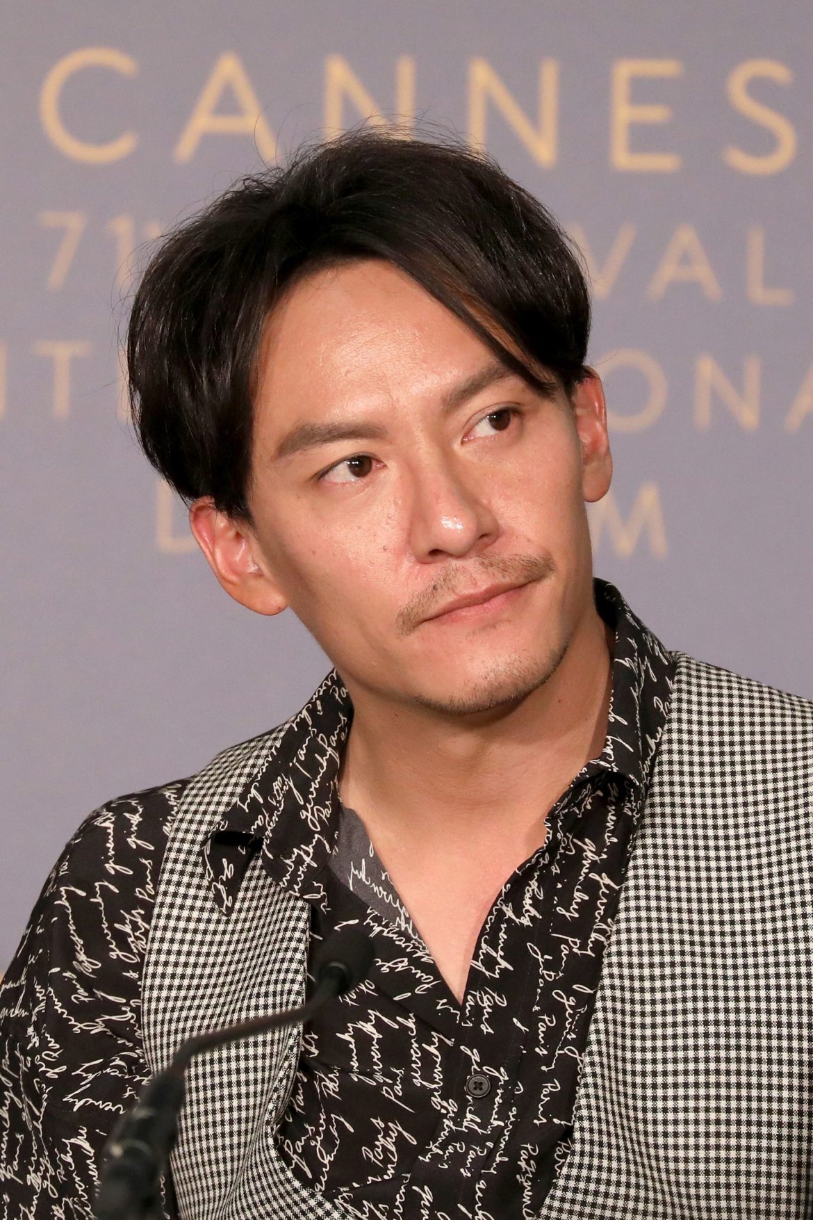 Chang Chen in Givenchy - 71st Annual Cannes Film Festival - Luxsure